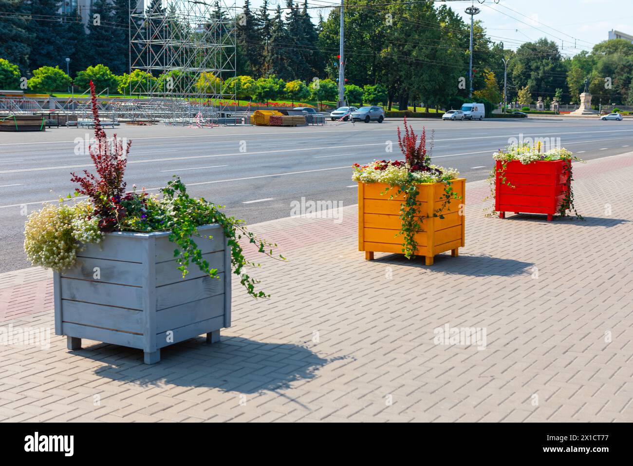 Colorful flowers in pots on the street in summer. Chisinau city ...