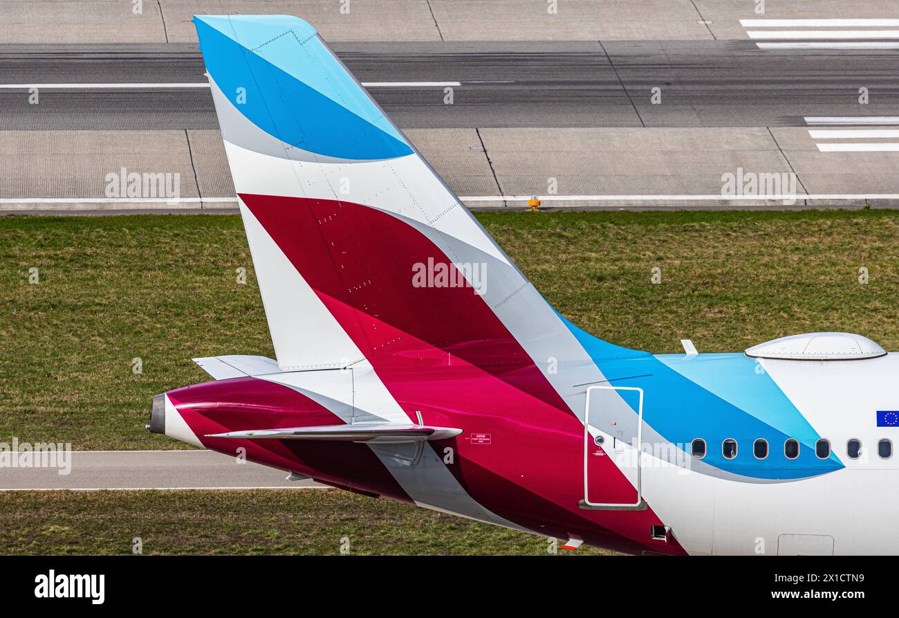 Tail fin of a Eurowings Airbus A320-214 taxiing to the runway at Zurich ...