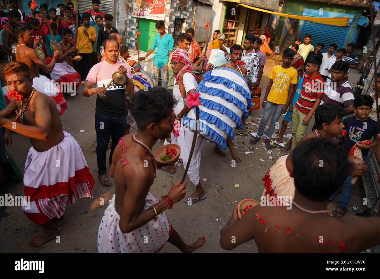 Devotees in Bainan, a village about 60 kilometers from Kolkata, are ...