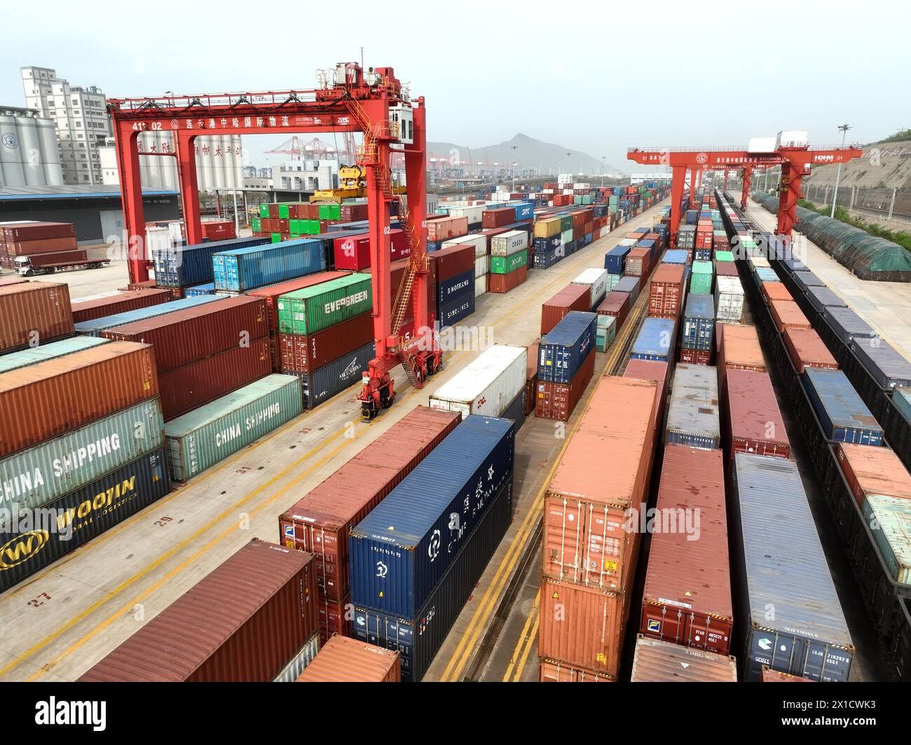 LIANYUNGANG, CHINA - APRIL 16, 2024 - Large machinery is loading ...