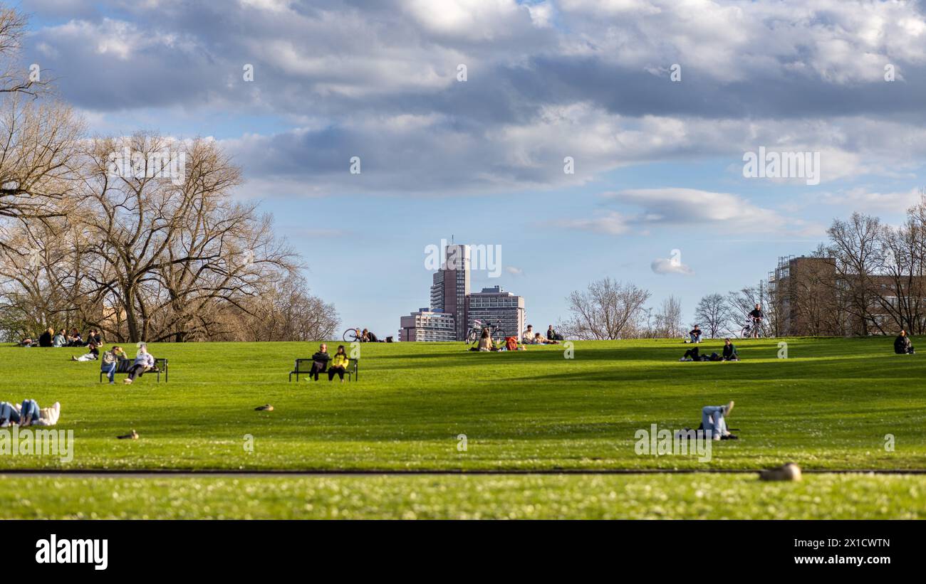 People enjoying a warm day in a public park in Cologne Stock Photo - Alamy