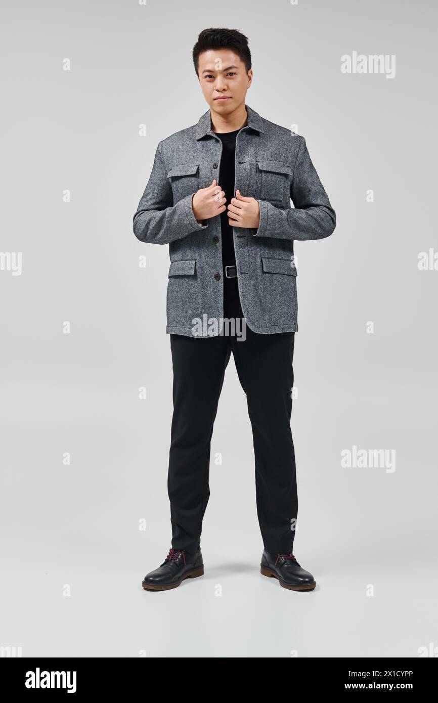Man standing confidently hands in hi-res stock photography and images ...