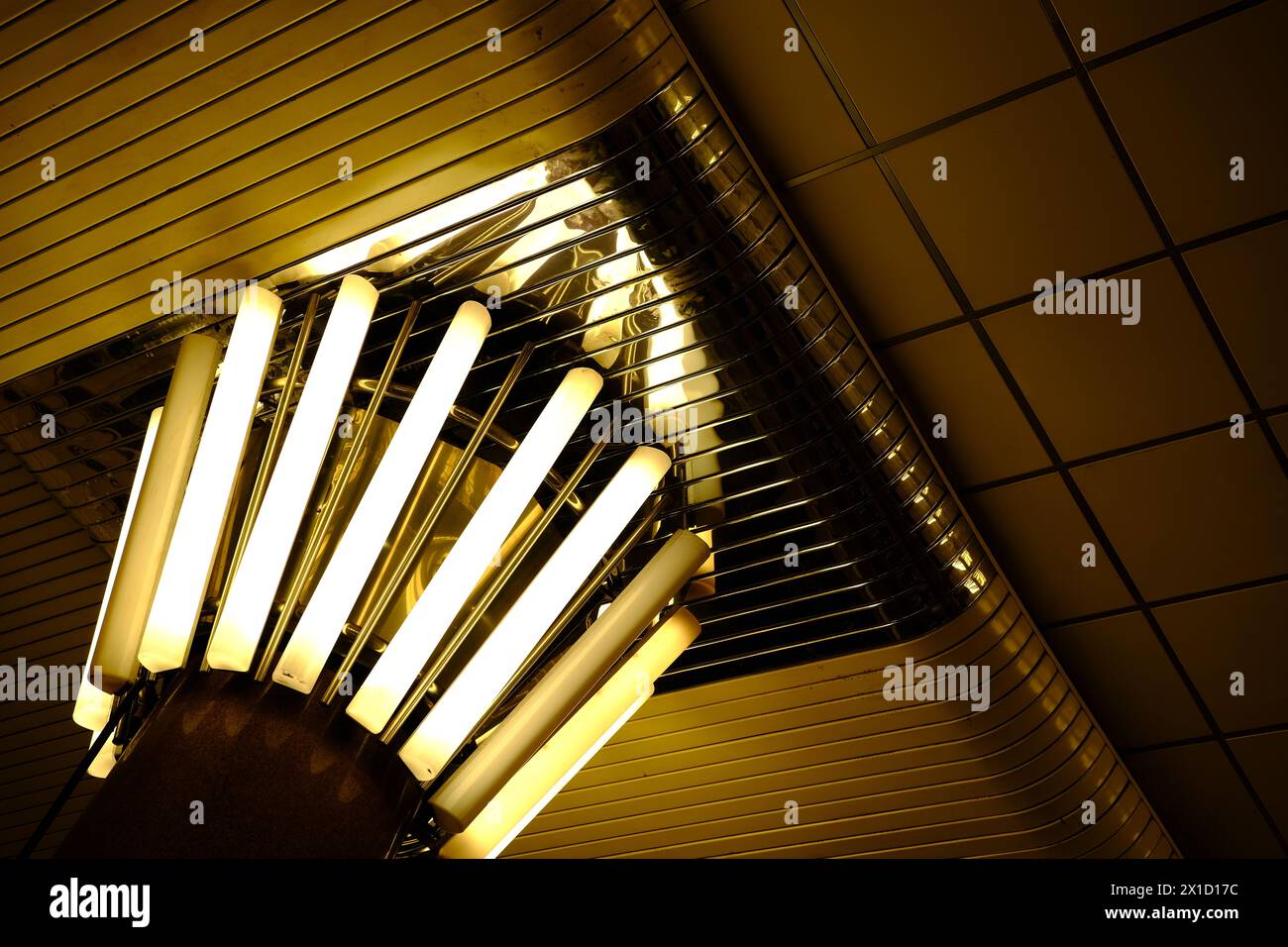 Lamps in subway kyiv Yellow light with reflections on metal parts of ...