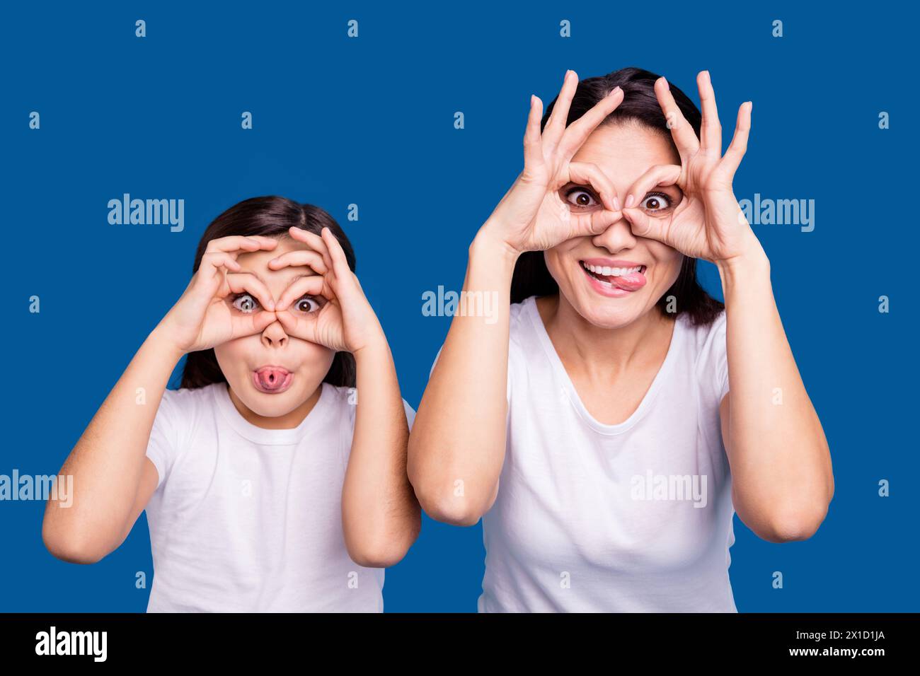 Close up photo beautiful two people brown haired mom little daughter ...