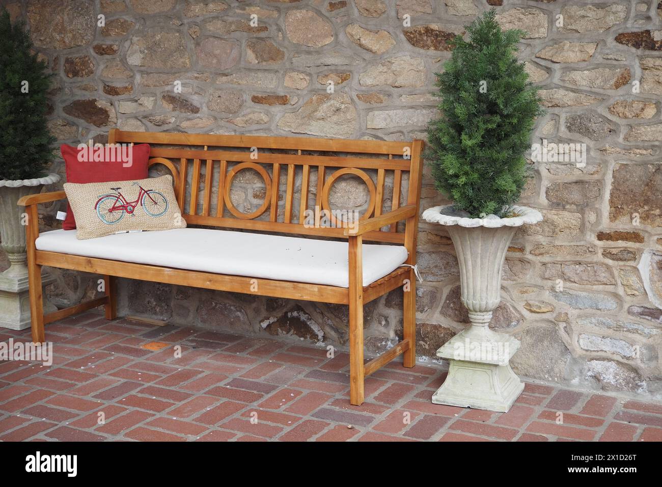 The wooden bench is a comfortable place to sit Stock Photo - Alamy