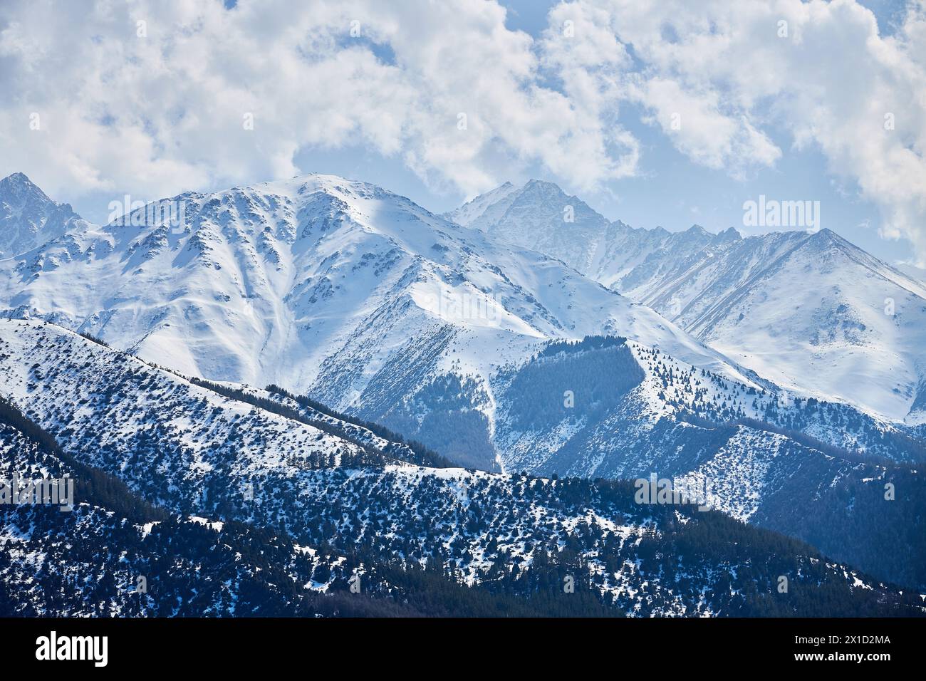 Snow capped high mountains. Chunkurchak valley in Kyrgyzstan. Winter ...
