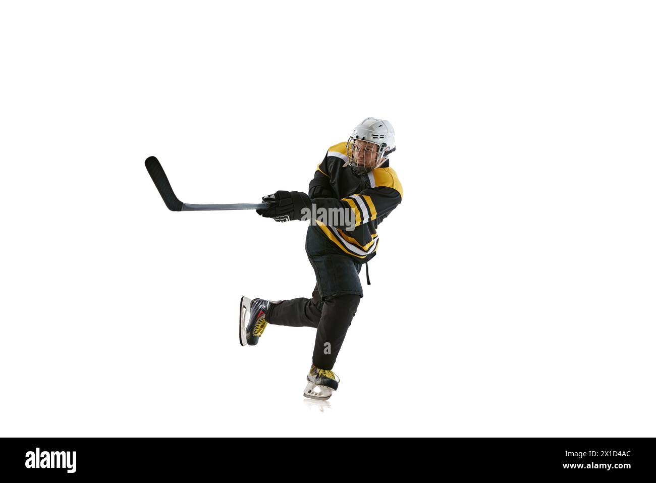 Male hockey player in motion during game with stick isolated on white ...