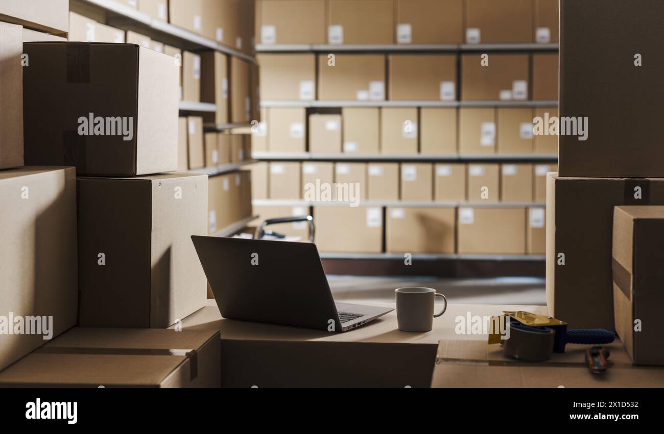 Workplace laptop cardboard boxes hi-res stock photography and images ...