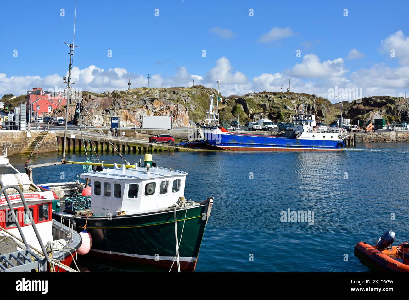Arranmore Ferry arrives at Burtonport harbour, County Donegal, ireland ...