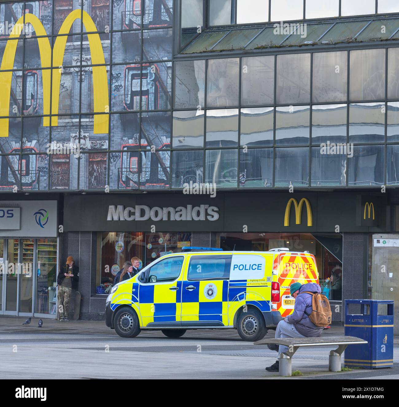 Police van at the shopping complex in the town centre of Corby, England ...