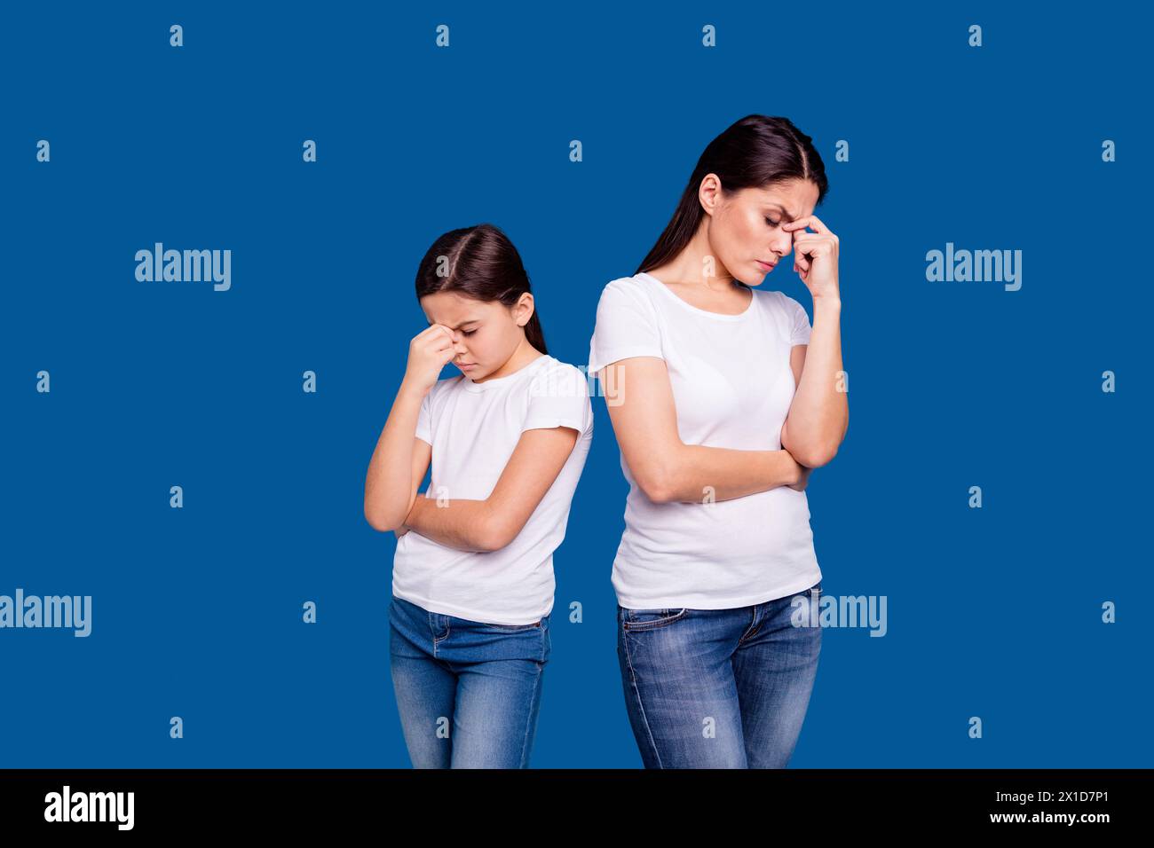 Close up photo two people brown haired mum disinterested small little ...