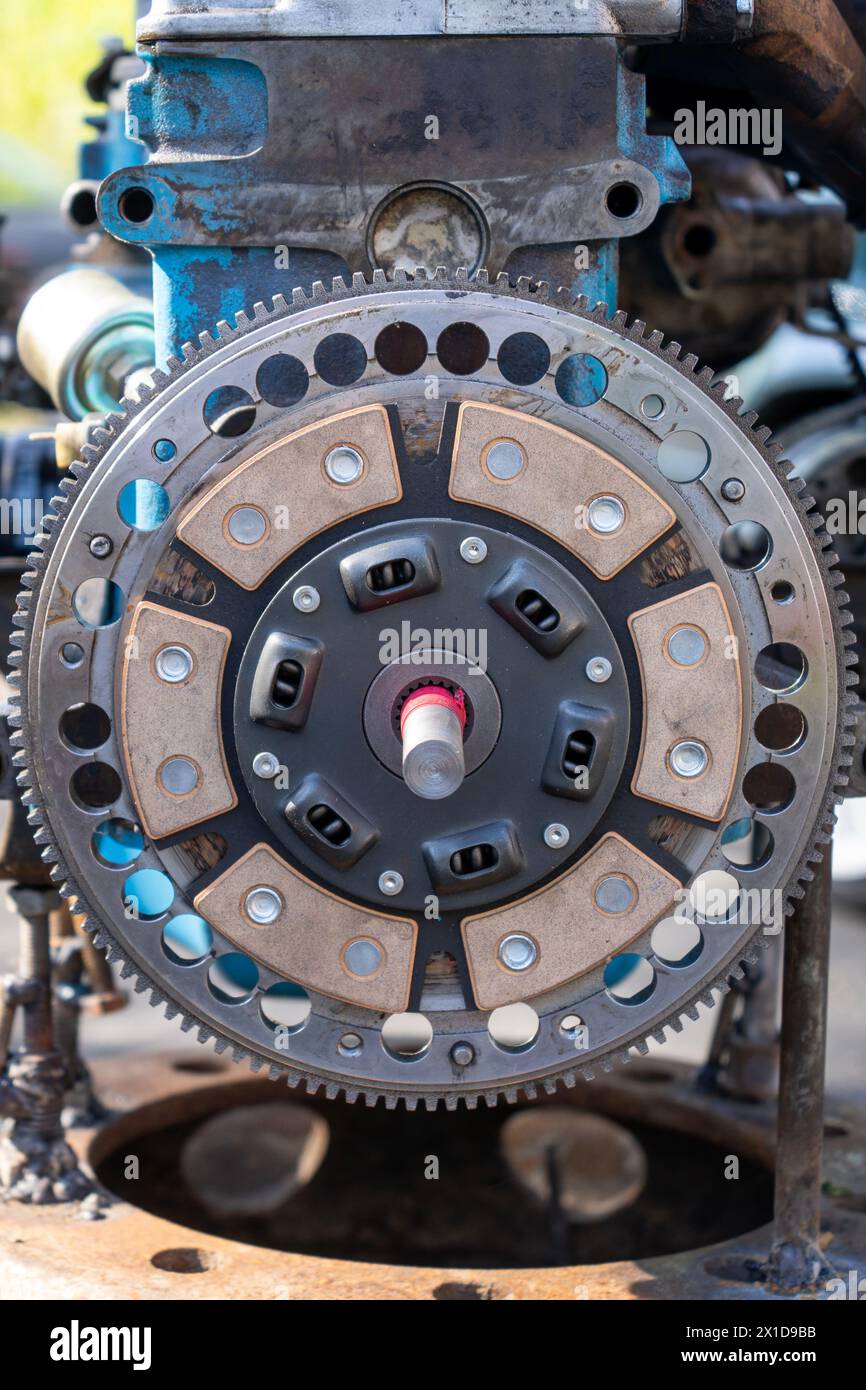 A gear disc on a dismantled car engine Stock Photo - Alamy