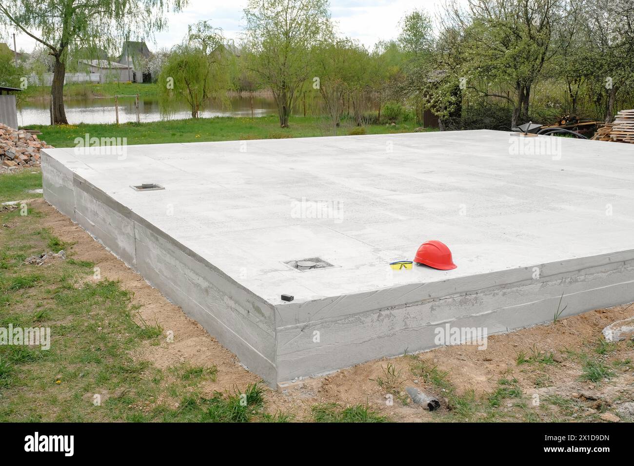 Cement foundation of a new house on a construction site. Laying a ...