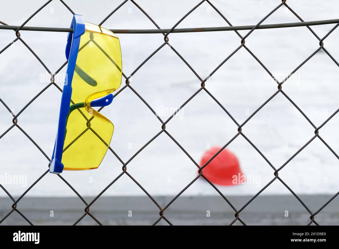 Construction of the foundation of a new house. Construction goggles on ...