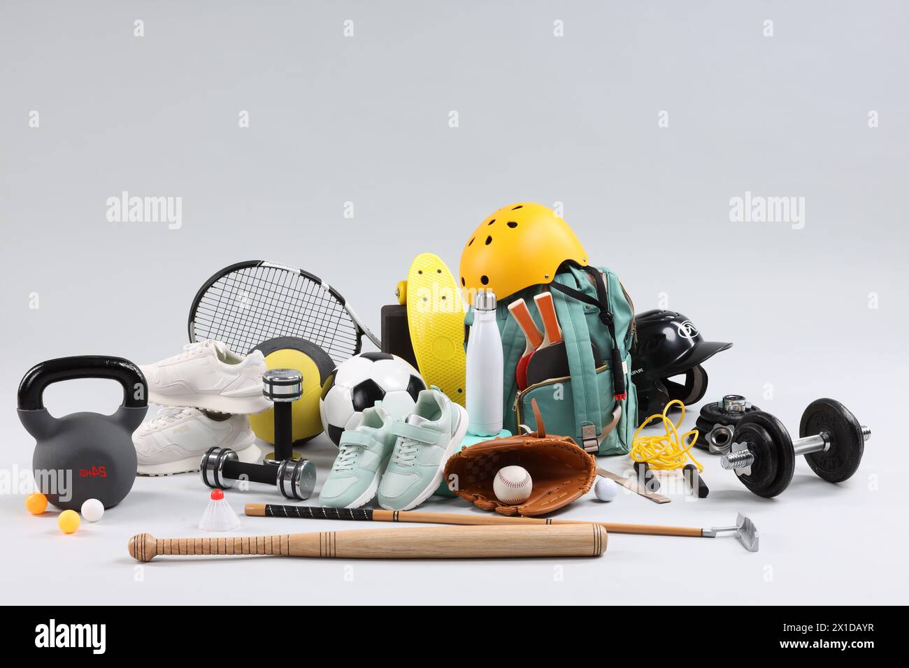 Many different sports equipment on light grey background Stock Photo ...