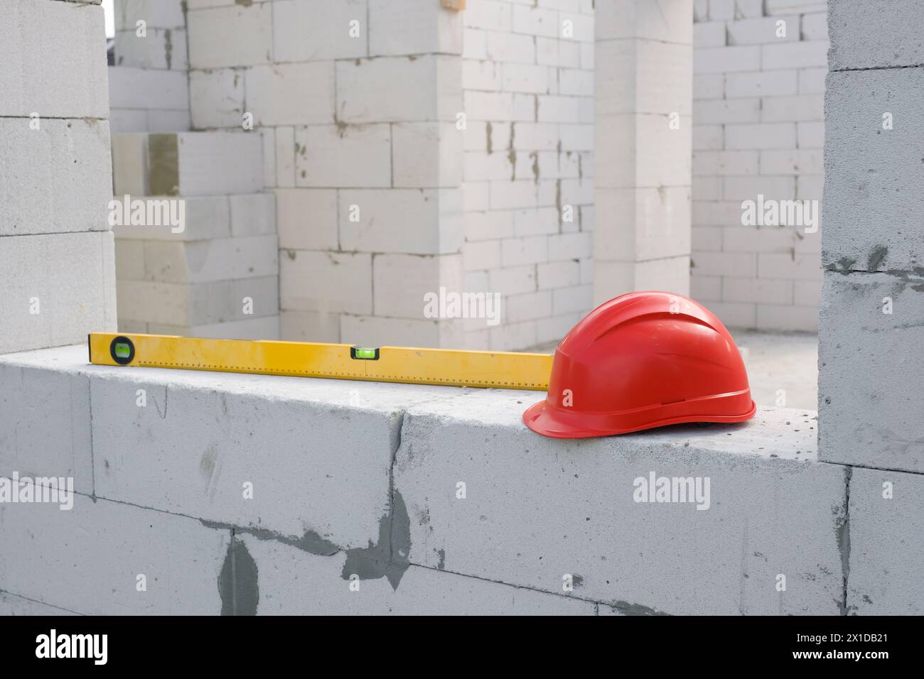 Construction safety helmet and construction level at the construction ...