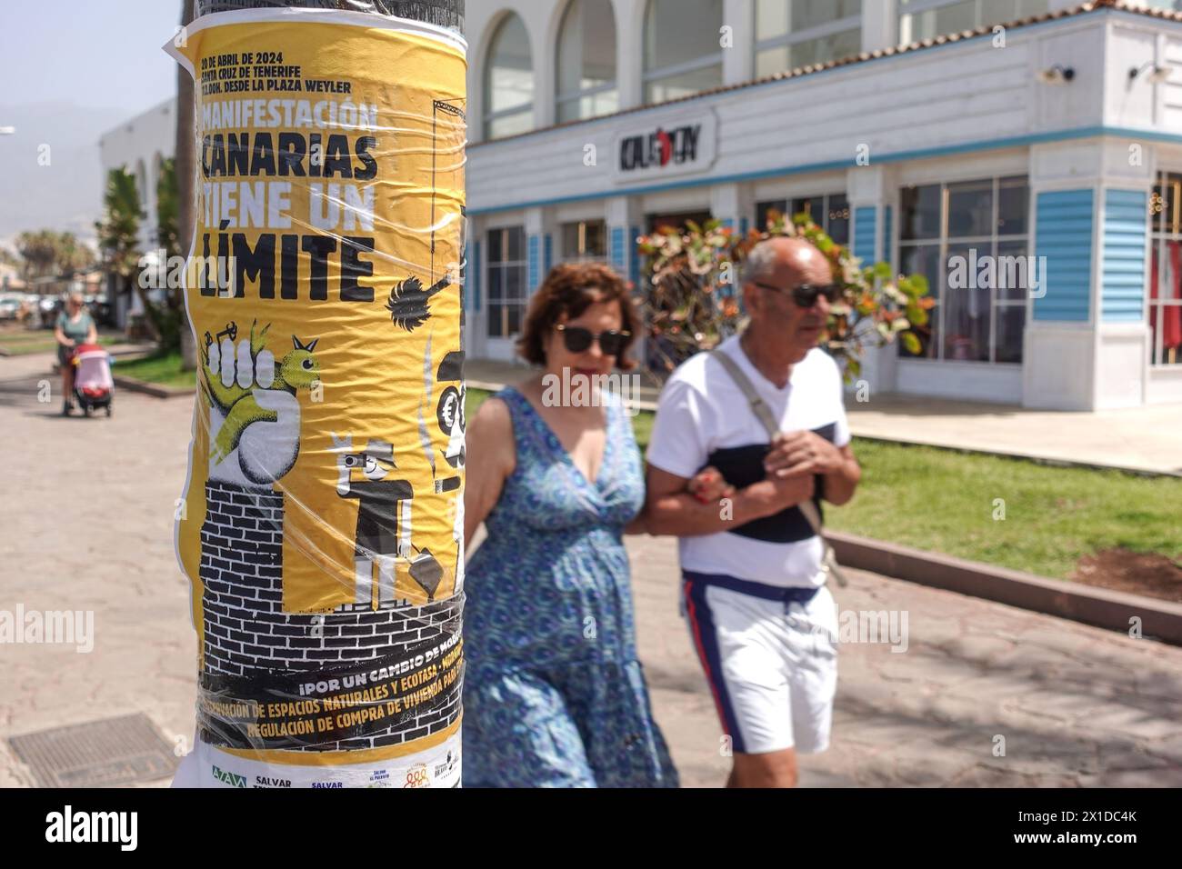 Los Cristianos, Tenerife, April 16th 2024 - Tourists walk past Anti ...