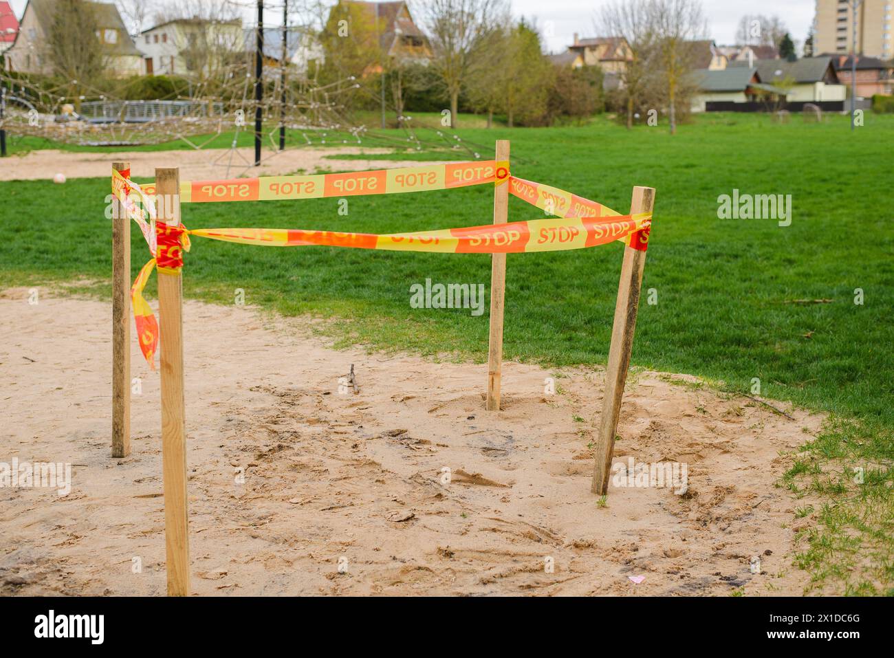the site is fenced off with orange stop tape. renovations are underway ...