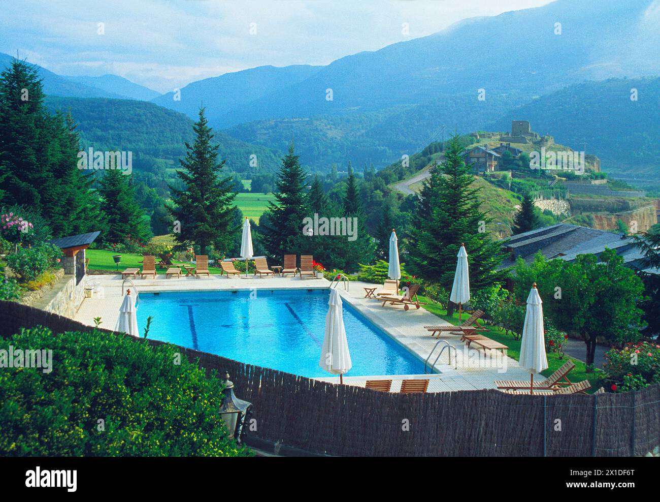 Swimmingpool and mountain landscape. El Castell hotel, Seu de Urgel ...