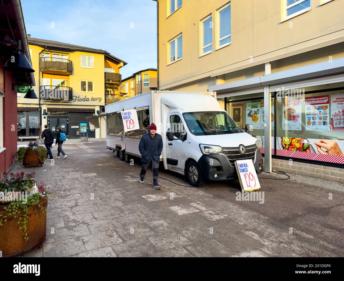 Refrigerated fishmonger truck selling fresh fish, prawns, crayfish and ...