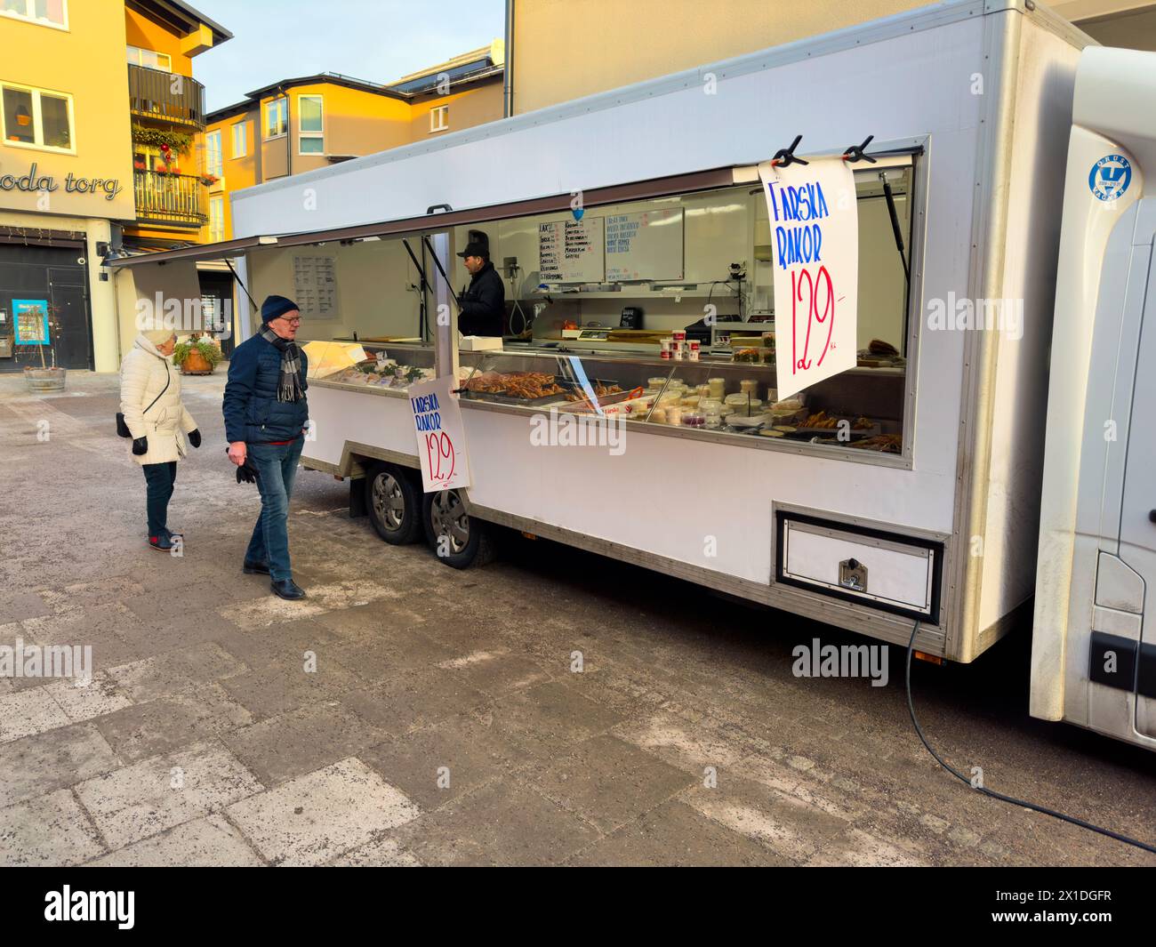 Refrigerated fishmonger truck selling fresh fish, prawns, crayfish and ...