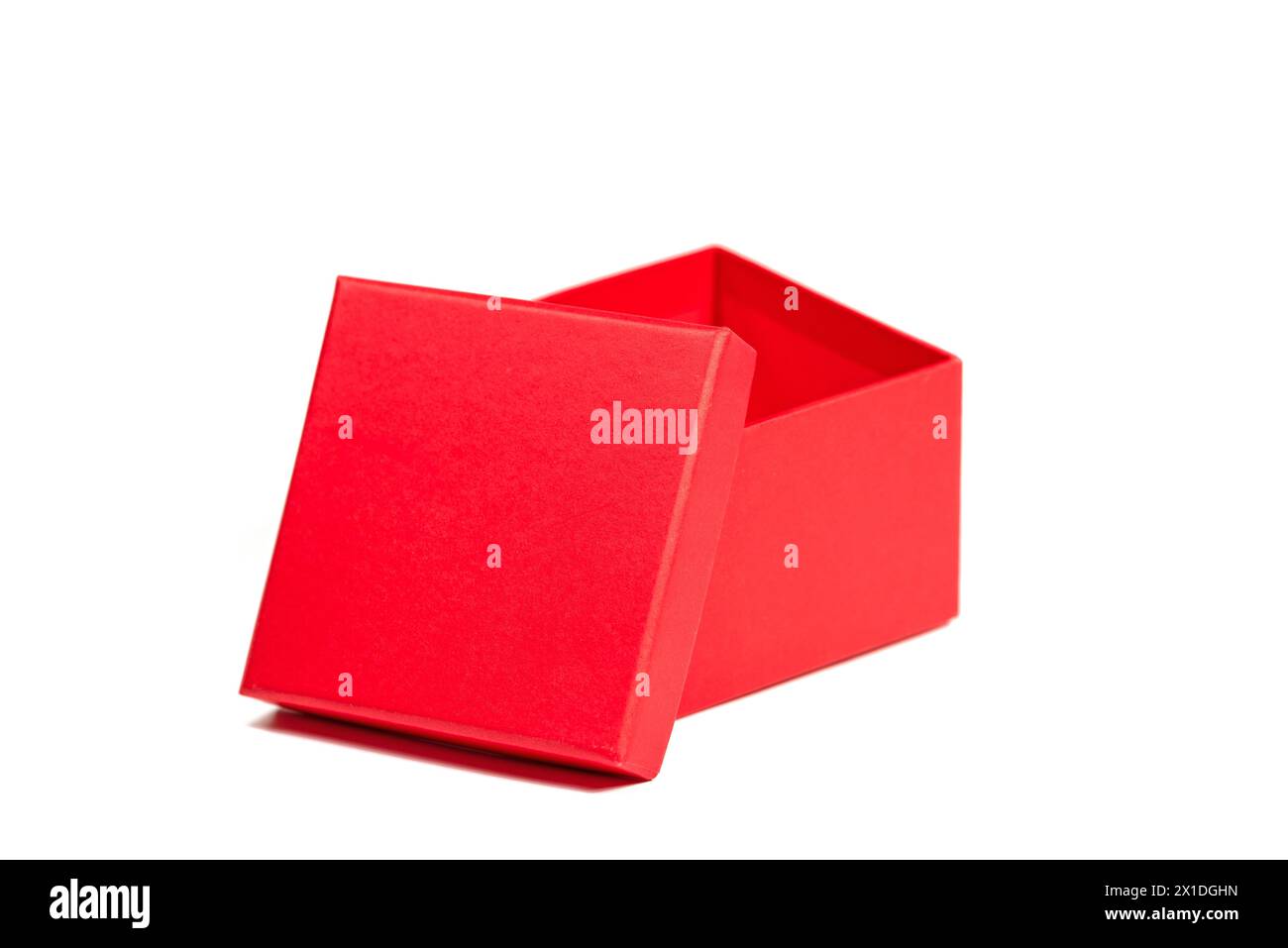 Red cardboard box against a white background Stock Photo - Alamy