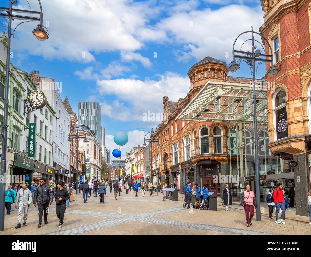 Shops on Briggate in the city centre, Leeds, West Yorkshire, England ...
