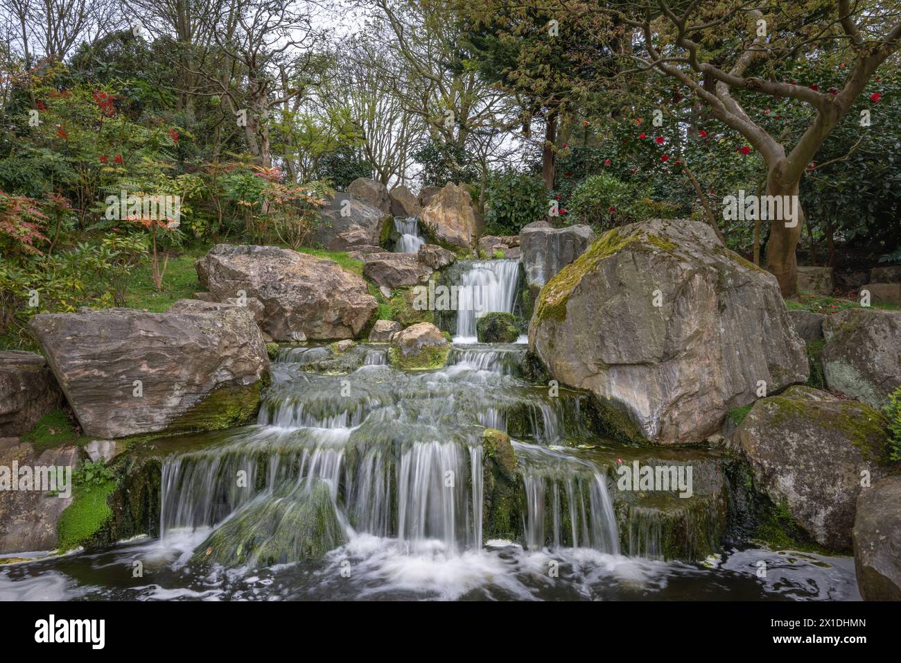 Waterfall in Kyoto Garden, a Japanese garden in Holland Park, London, UK. Holland Park is a ...