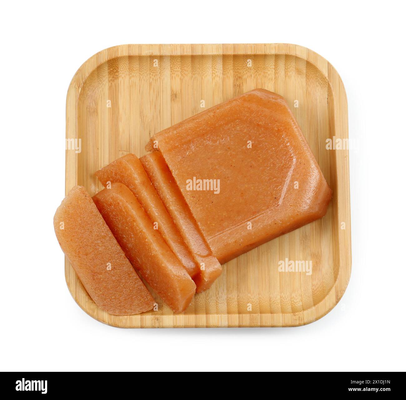 Delicious sweet quince paste isolated on white, top view Stock Photo ...