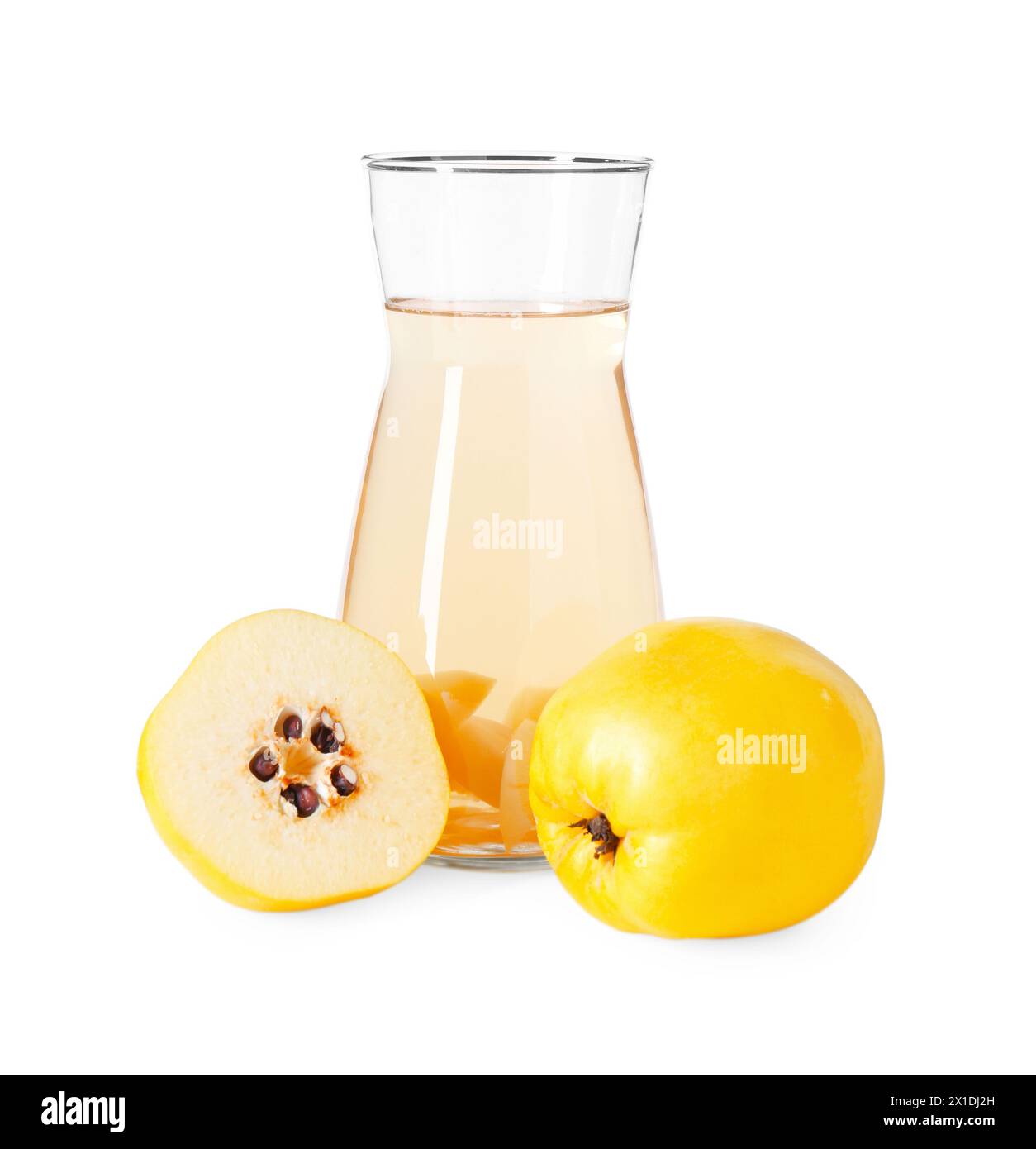Tasty quince drink in glass carafe and fresh cut fruits isolated on ...