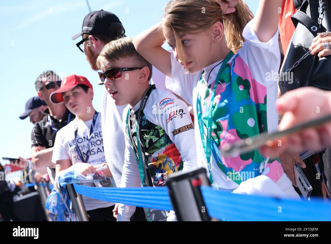 Fans wait for the drivers during the autograph session at the ABB ...