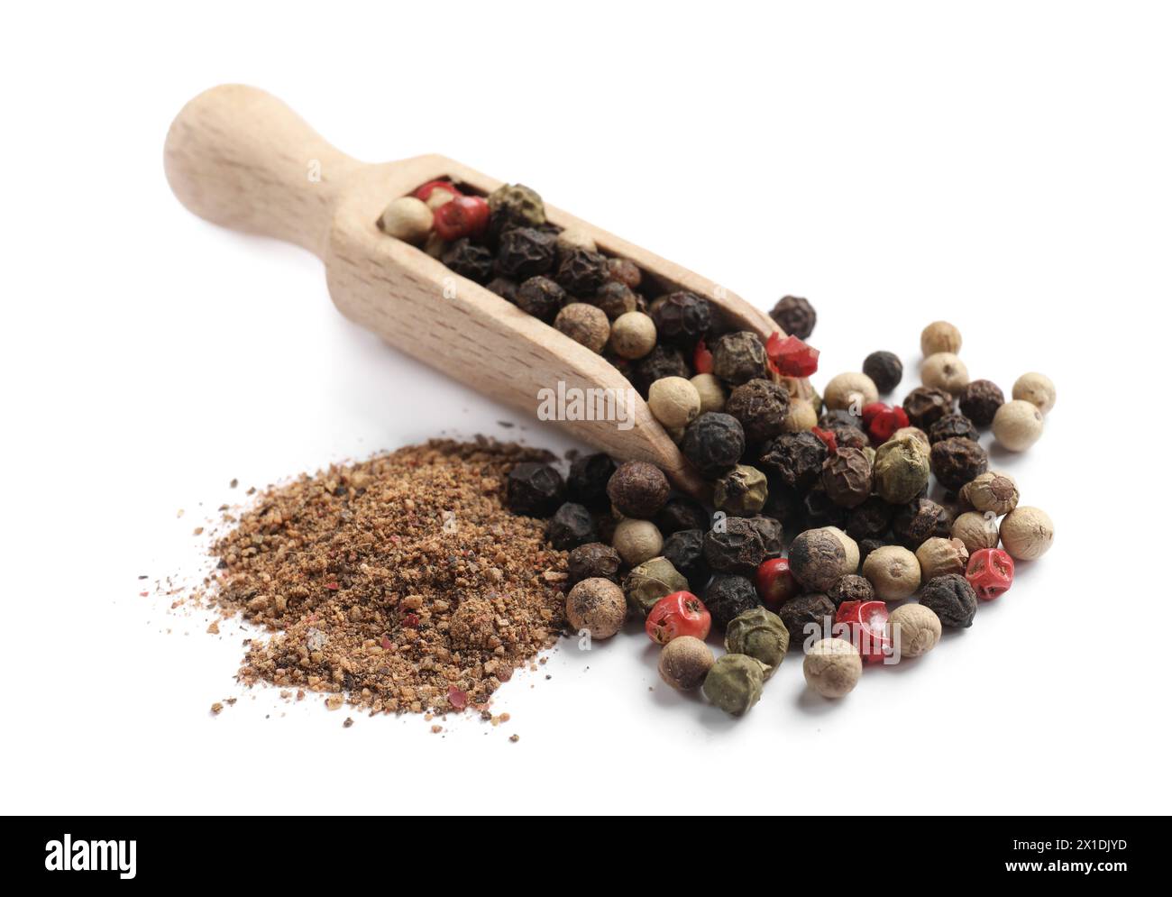 Aromatic spices. Different ground and whole peppers with wooden scoop ...