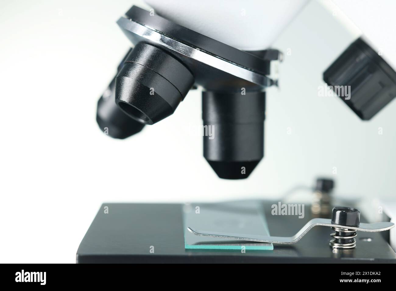 Modern microscope on light background, closeup view Stock Photo - Alamy