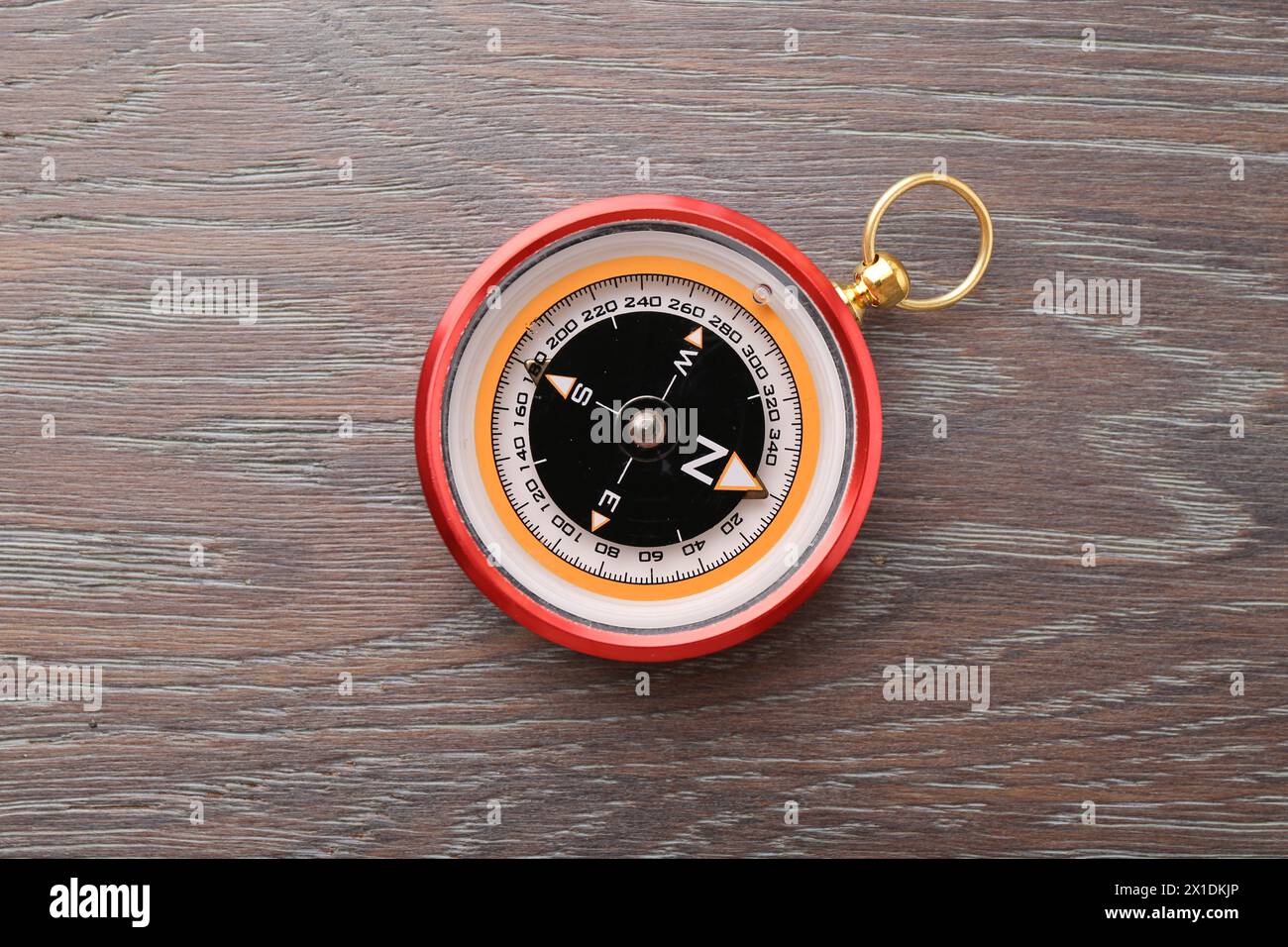One compass on wooden hi-res stock photography and images - Alamy