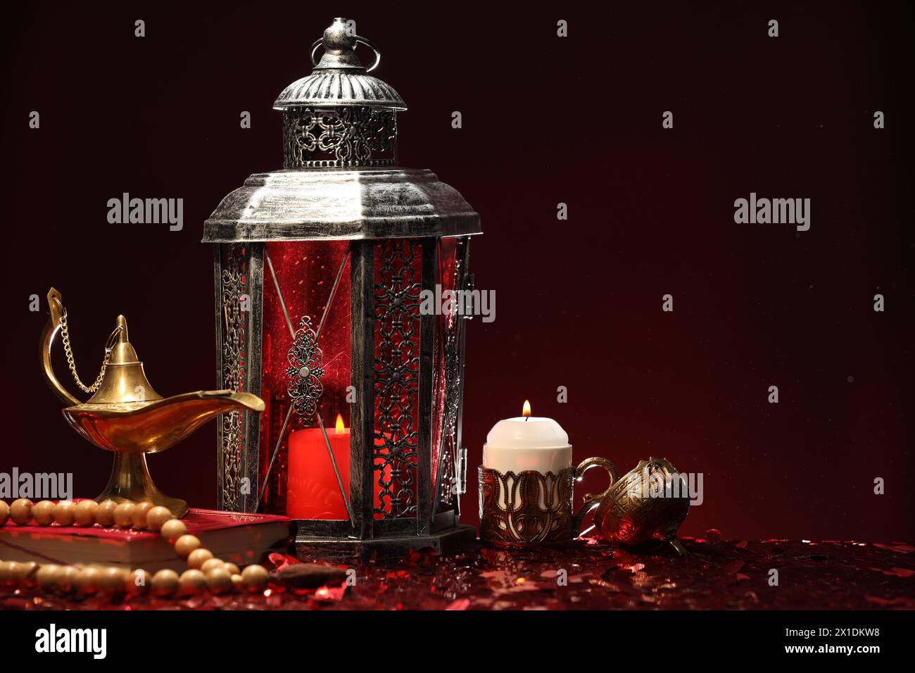 Arabic lantern, Quran, misbaha, burning candle and Aladdin magic lamp ...