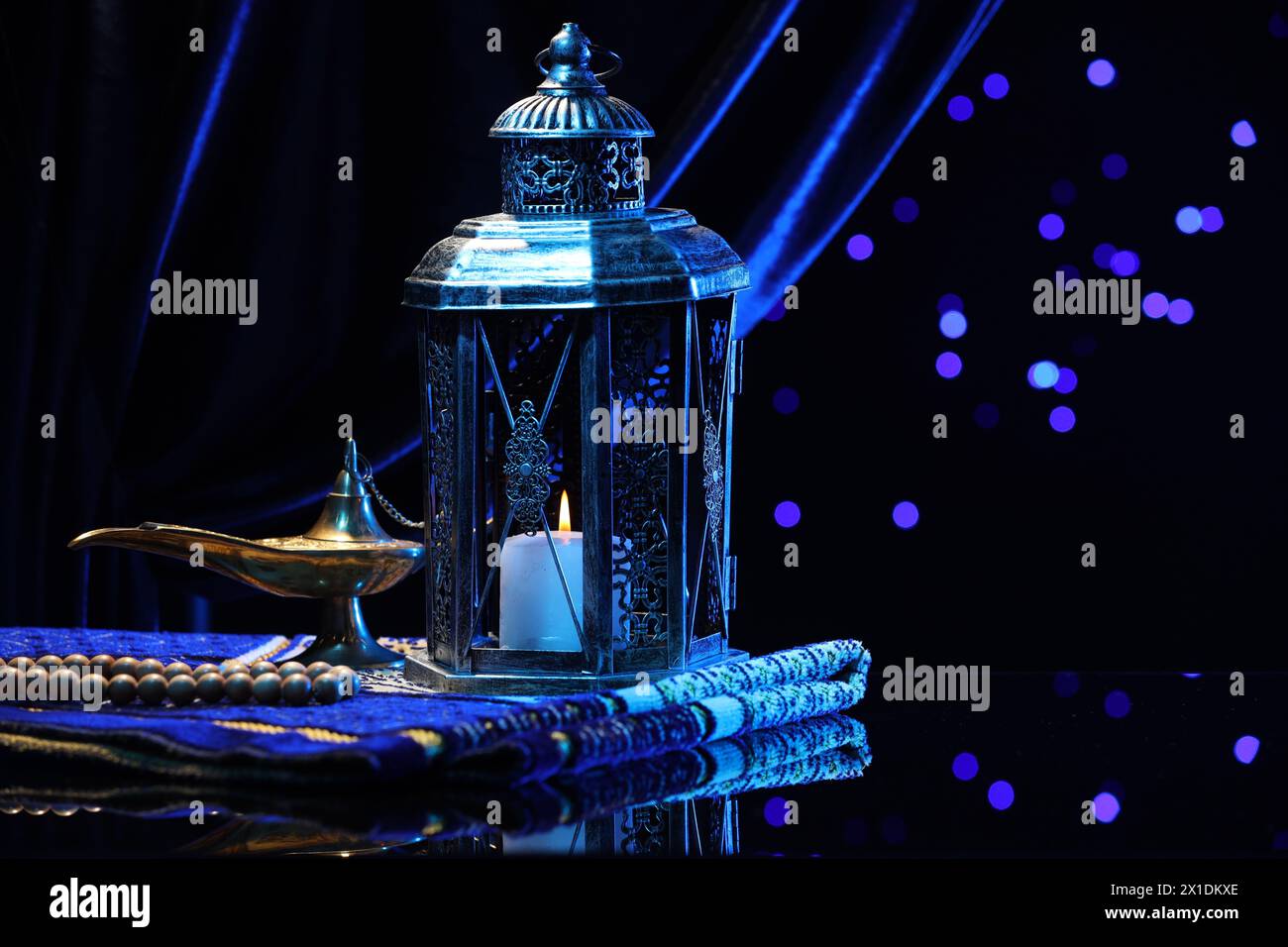 Arabic lantern, misbaha, Aladdin magic lamp and folded prayer mat on ...