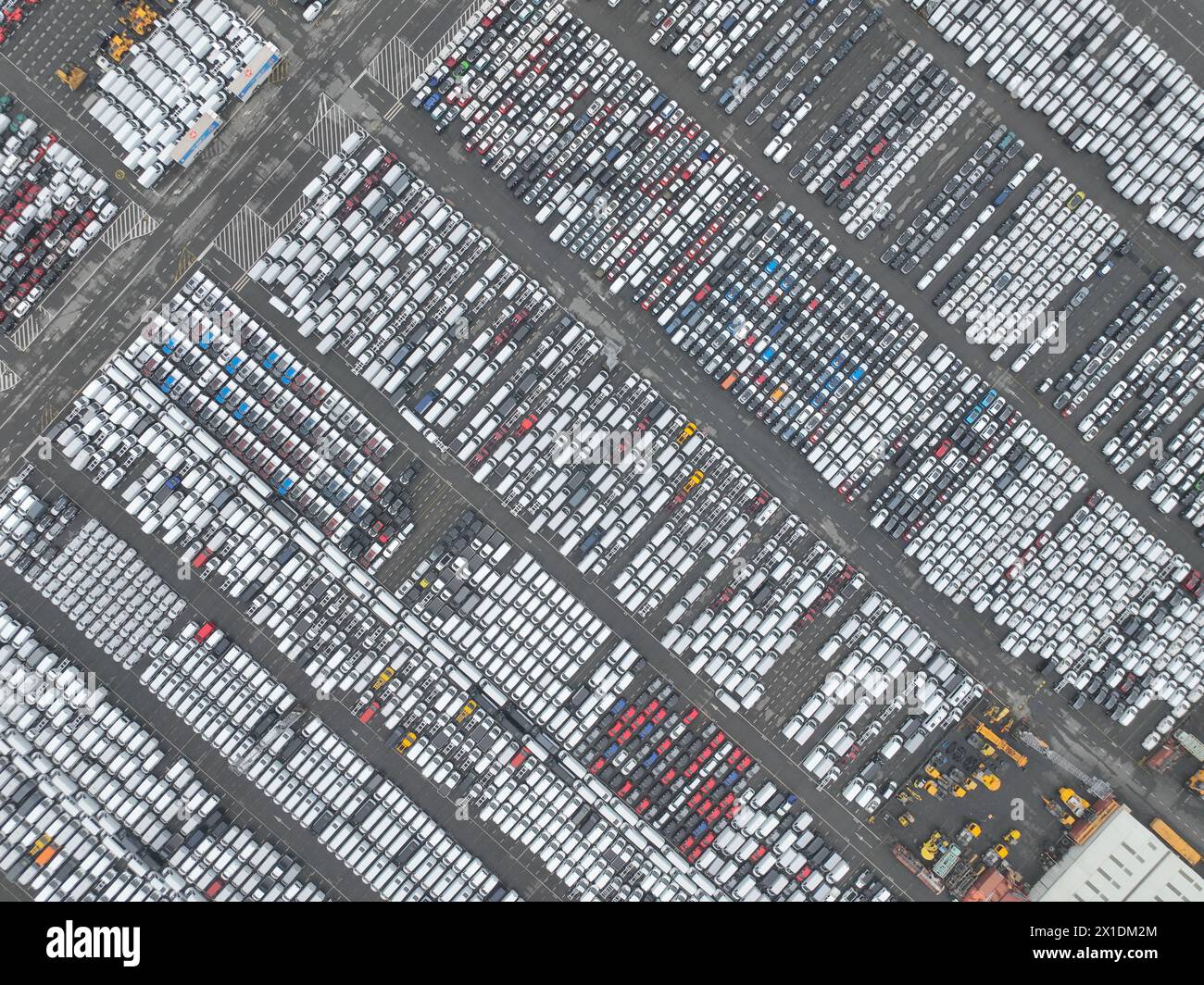 Aerial top down drone views of transportation of vehicles over seas from a sea port terminal ...