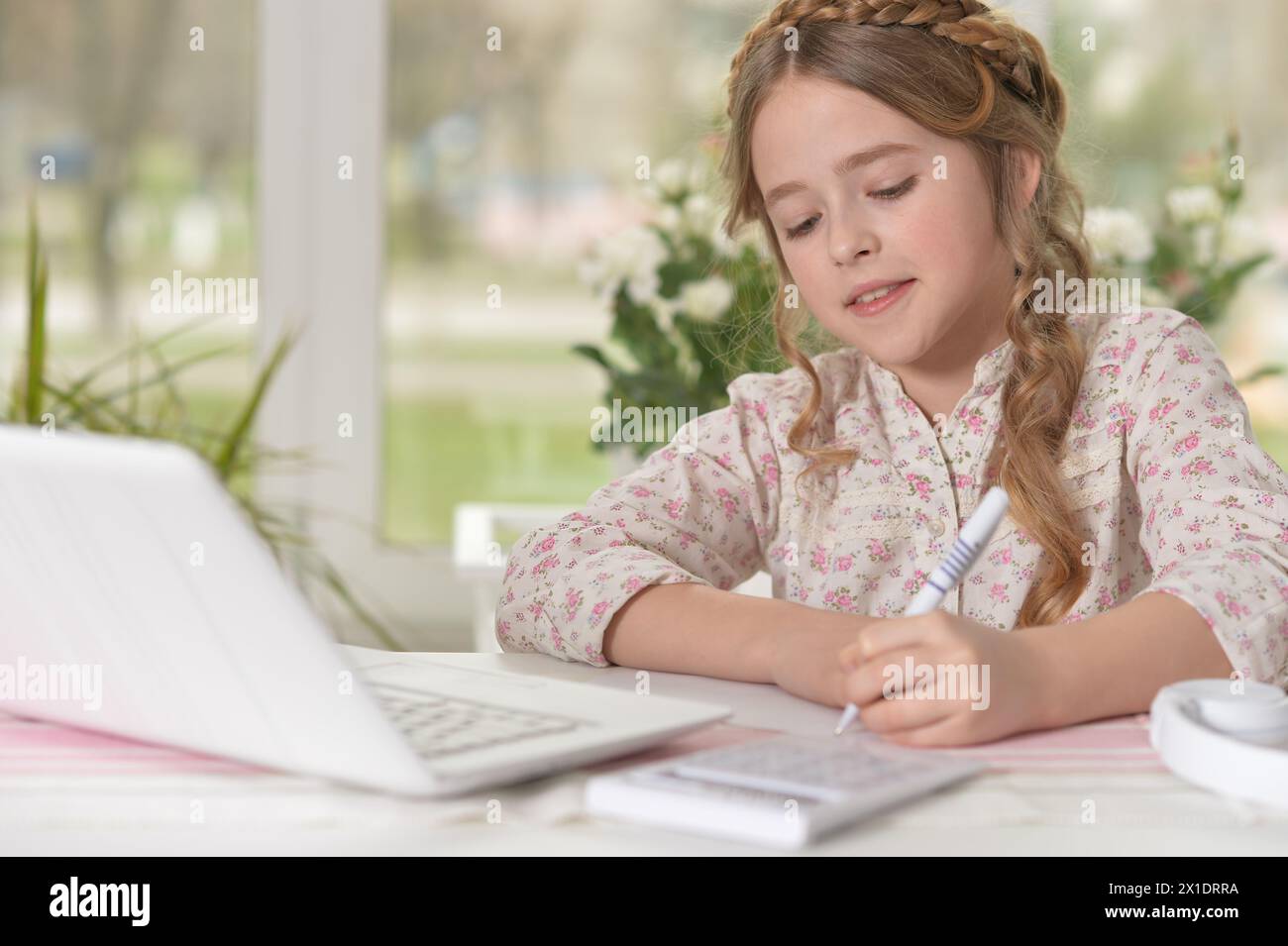 Cute and happy little girl children using laptop computer Stock Photo ...