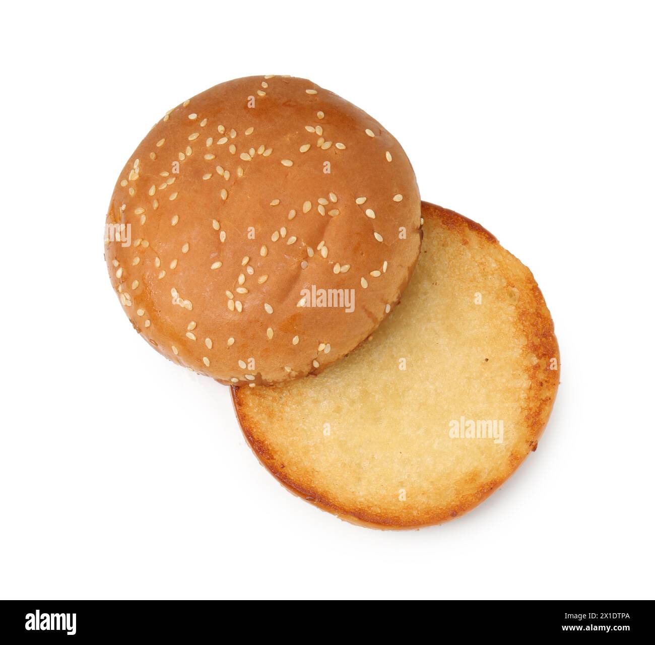 Halves of grilled burger bun isolated on white, top view Stock Photo ...