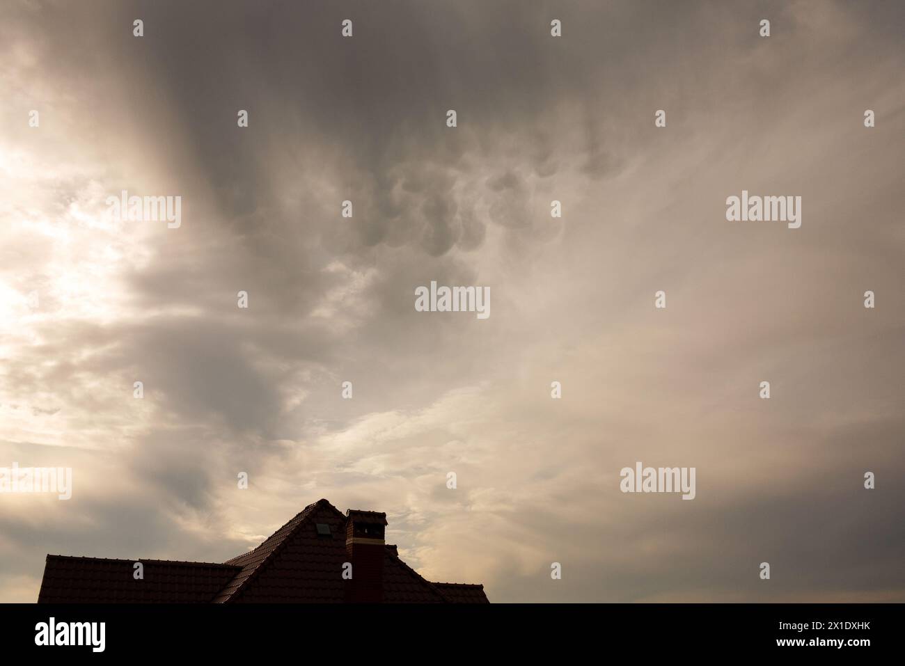 Mammatus clouds, cotton wool clouds that form at the base of ...