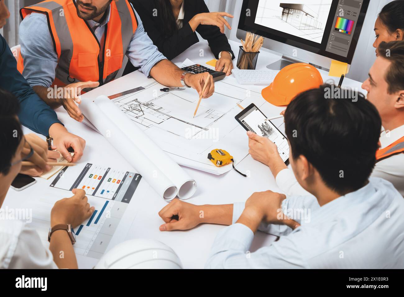 Diverse group of civil engineer and client working together on ...