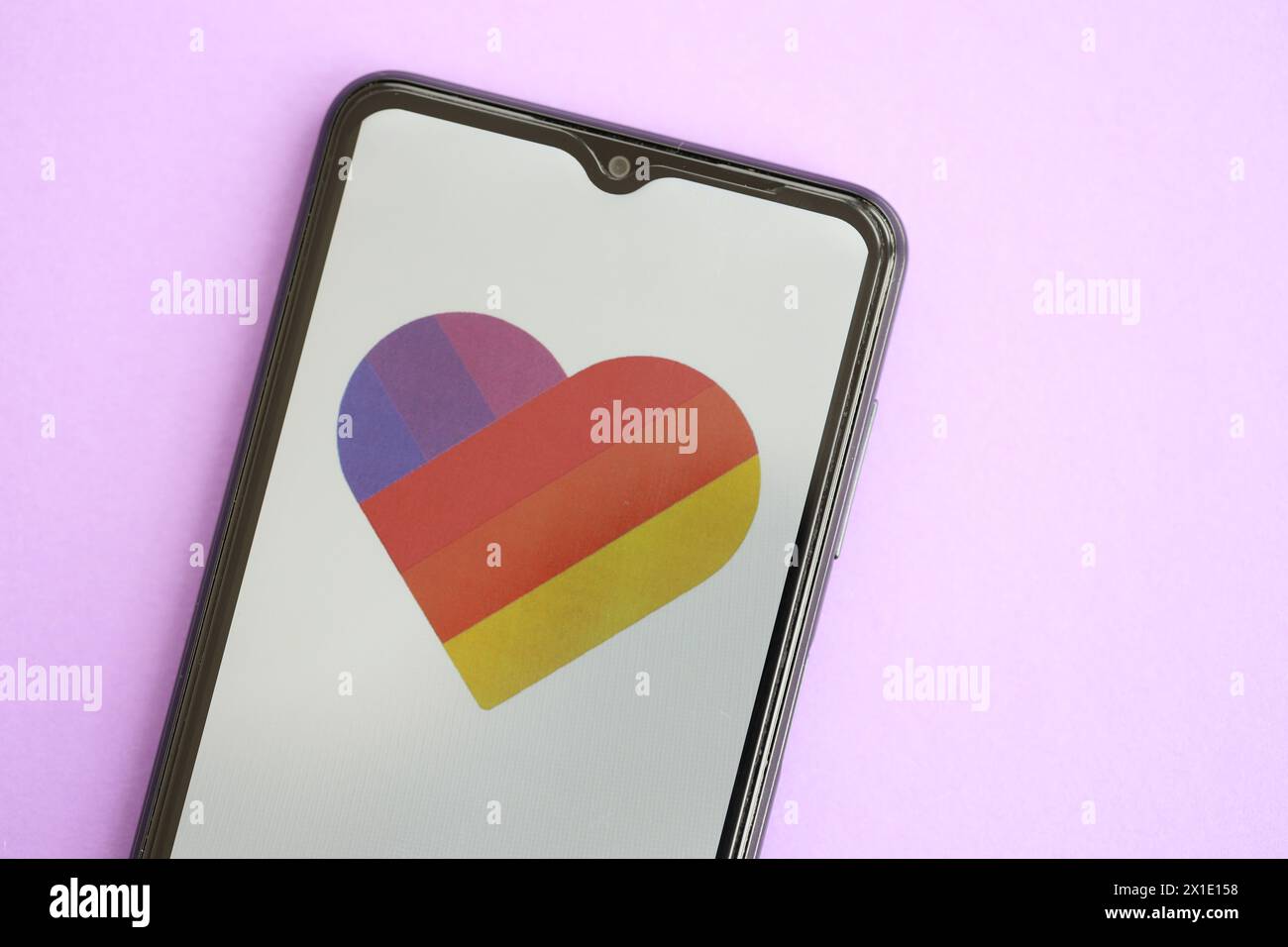 KYIV, UKRAINE - APRIL 1, 2024 Likee icon on smartphone screen on purple ...