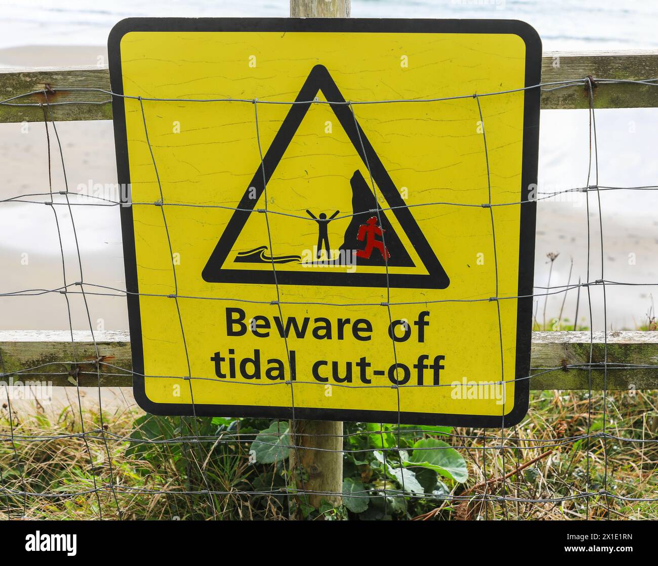 A warning sign saying 'Beware of tidal cut-off', Praa Sands, south west ...