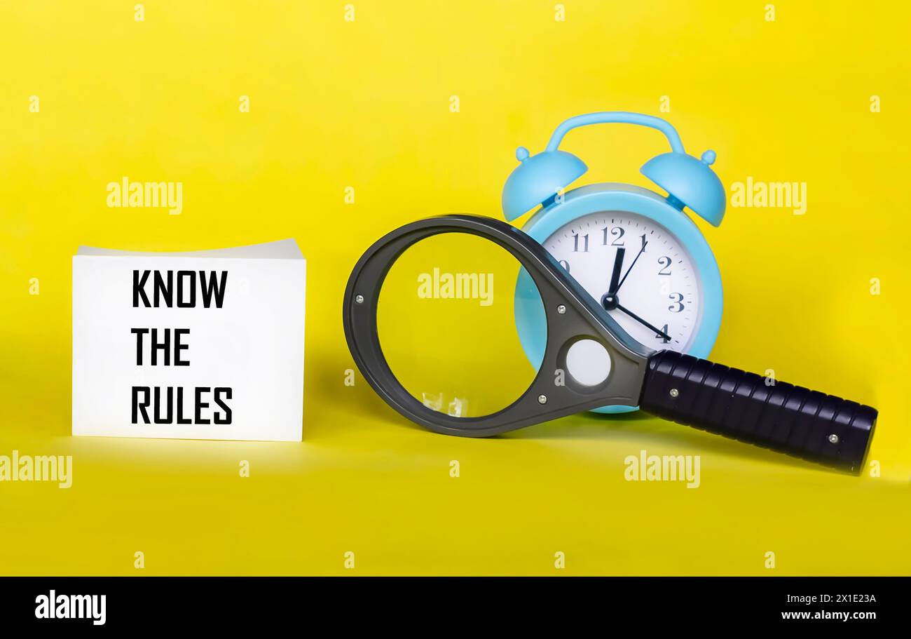 Know the rules word on a notepad on a yellow background. concept of ...