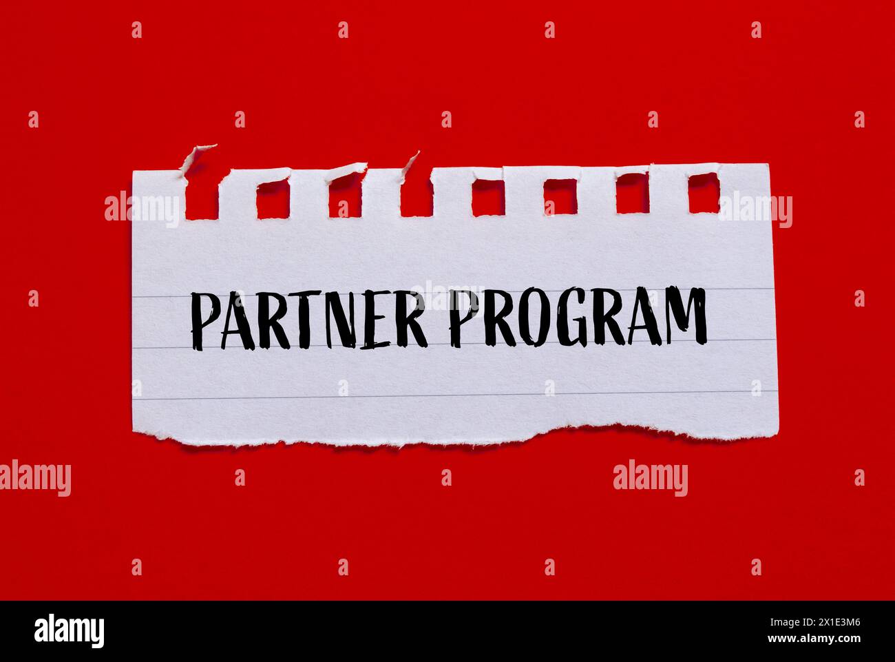 Partner program words written on ripped paper. Conceptual partner ...