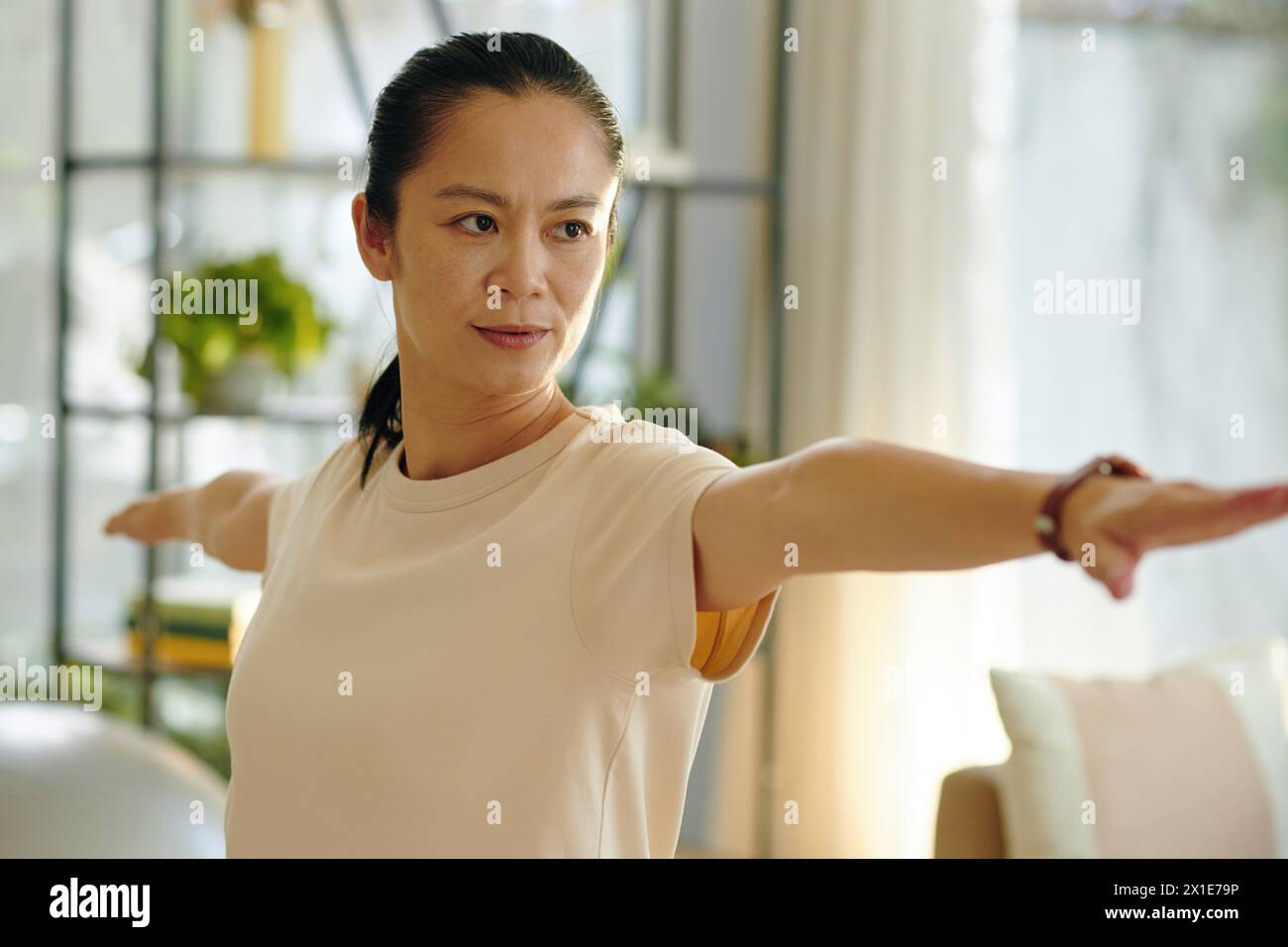 Determined mature asian female hi-res stock photography and images - Alamy