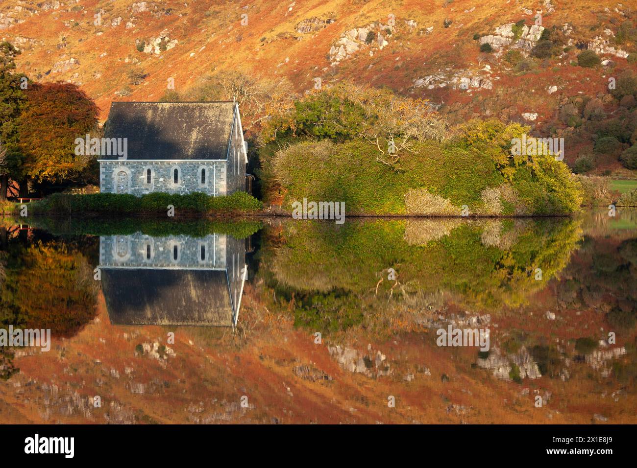 Lake reflections of Gougane Barra chapel in West Cork in Ireland Europe ...