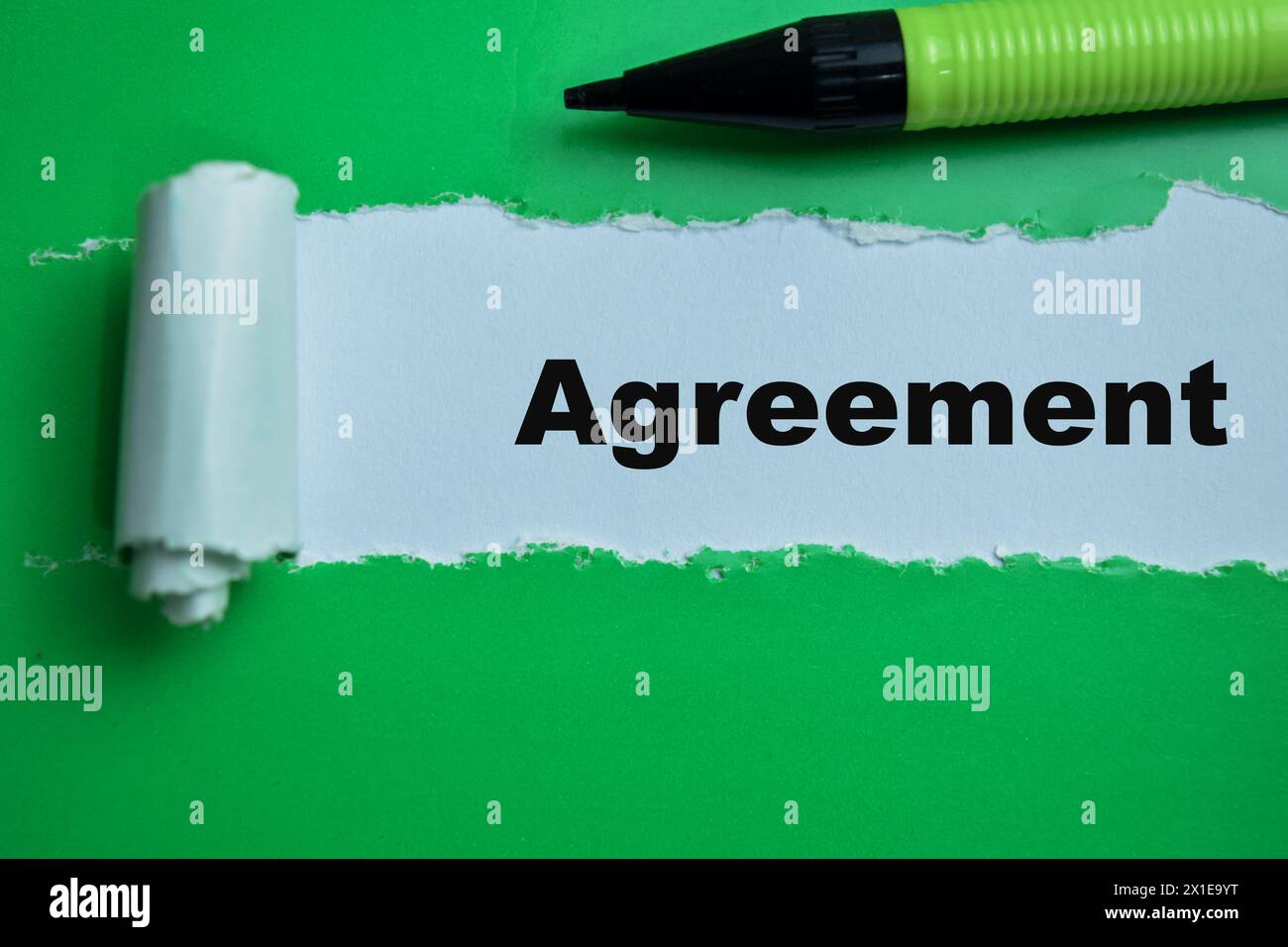 Concept of Agreement Text written in torn paper Stock Photo - Alamy