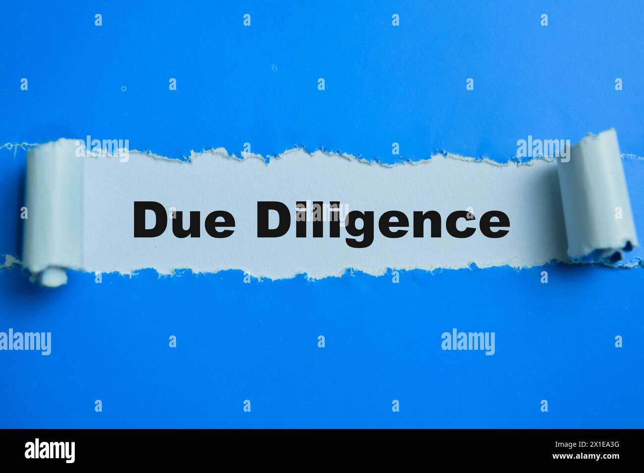 Concept of Due Diligence Text written in torn paper Stock Photo - Alamy