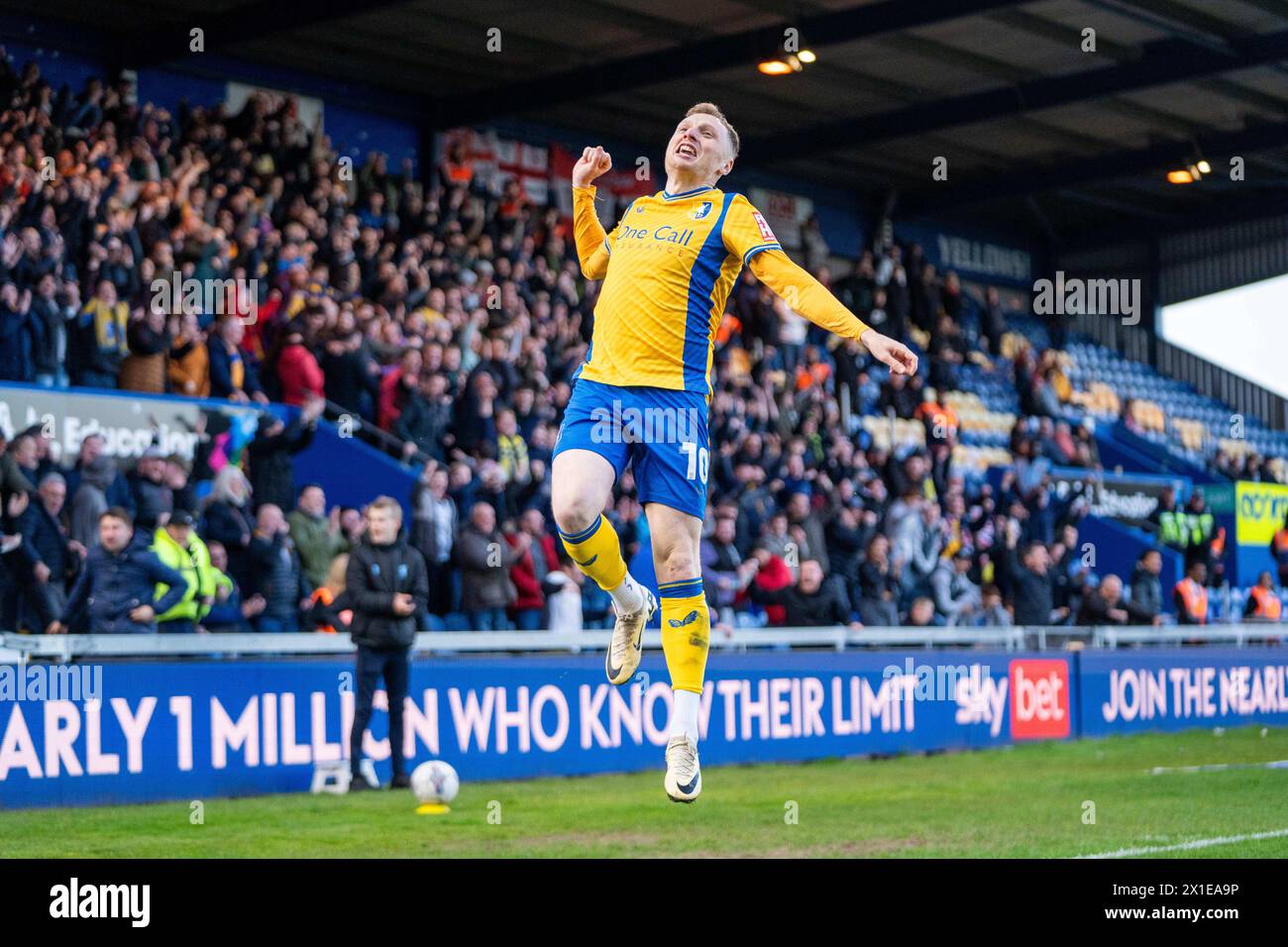 Mansfield Town FC forward George Maris (10) scores a GOAL 1-0 and ...